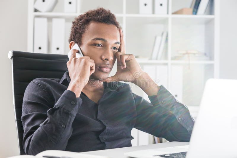 Focused black man on phone stock photo. Image of concentrated - 73103650