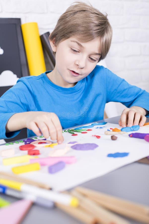 Focused Boy with Art Utensils Stock Photo - Image of manual, childhood ...