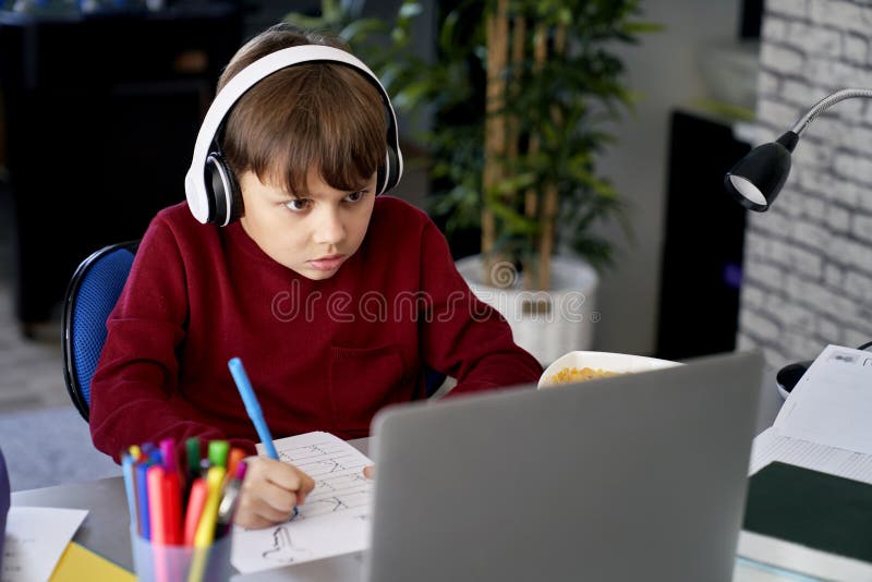 Focused Schoolboy Practicing His Handwriting Stock Image - Image of ...