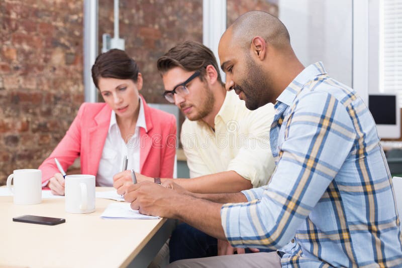 Focused Business People Taking Down Important Notes Stock Photos - Free ...