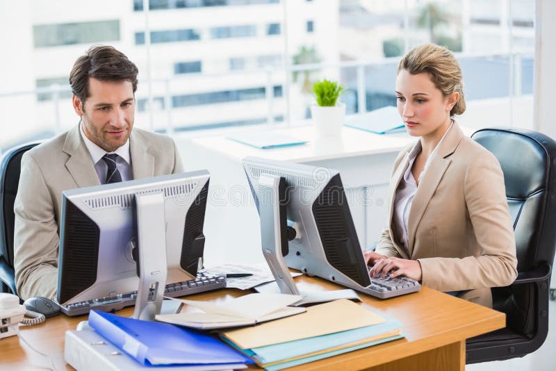 Focused Business People Using Computer Stock Photo - Image of female ...