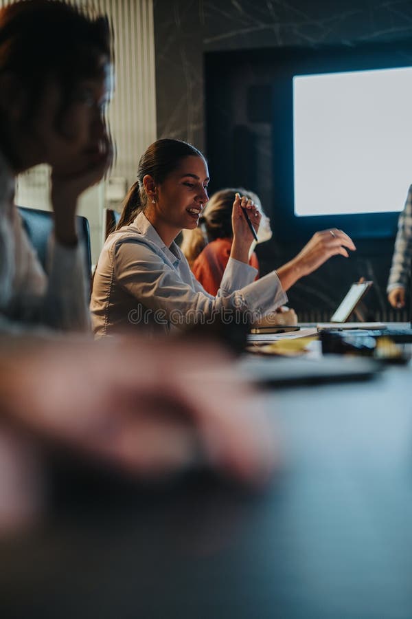 Business Team Collaborating during a Late-night Office Work Session ...