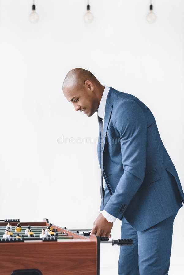 Focused Businessman in Suit Playing Table Football Stock Image - Image ...