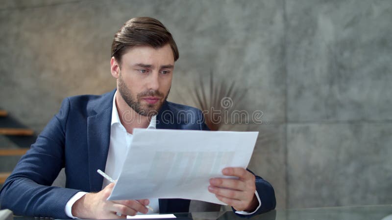 Focused Businessman Working with Documents in Office. Business Man ...