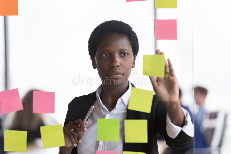 Focused Busy African Employee Using Scrum Method, Task Management Tools ...