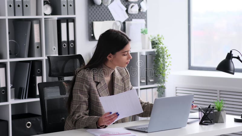 Focused Caucasian Woman Managing Documents in Office Stock Footage - Video of woman, online ...
