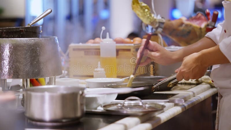 Focused Chef in Action a Side-view Capture of a Dedicated Chef Immersed ...