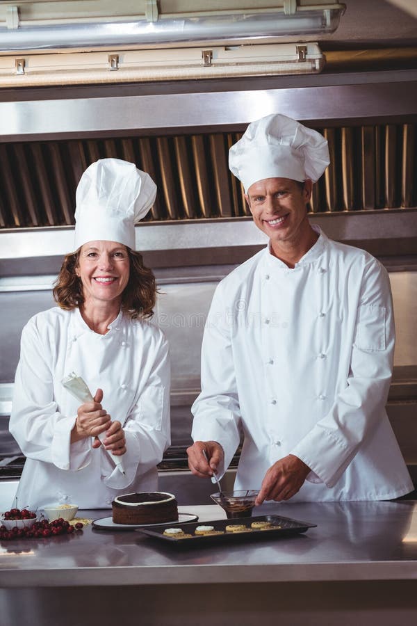 Focused Chef Preparing a Cake Stock Photo - Image of making, catering ...