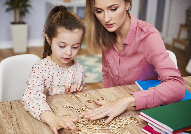 Focused Child Learning the Alphabet Stock Photo - Image of domestic ...