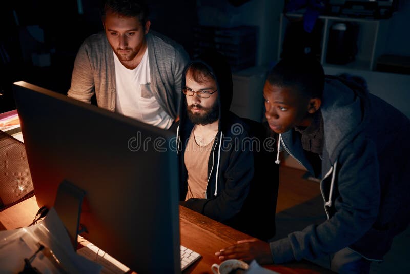 Focused on the Code. Young Computer Programmers Working Late in the Office. Stock Photo - Image ...