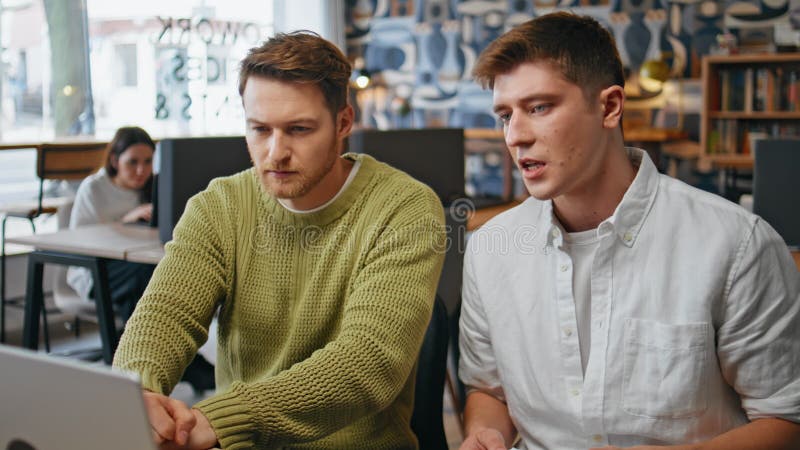 Focused Colleagues Staring Computer Screen at Room. Closeup Creative ...