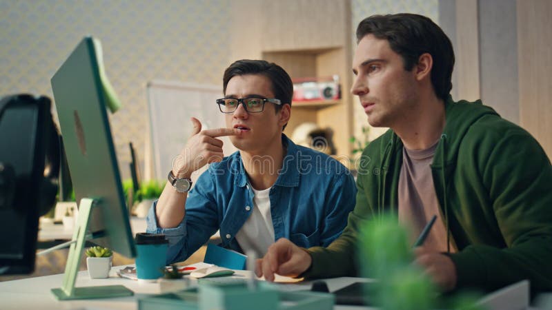 Focused Colleagues Staring Computer Screen at Room. Closeup Creative ...