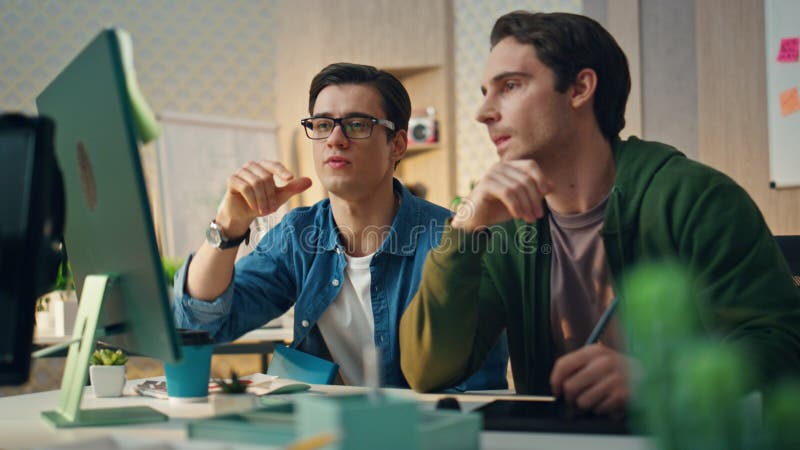 Focused Colleagues Staring Computer Screen at Room. Creative Men Work ...