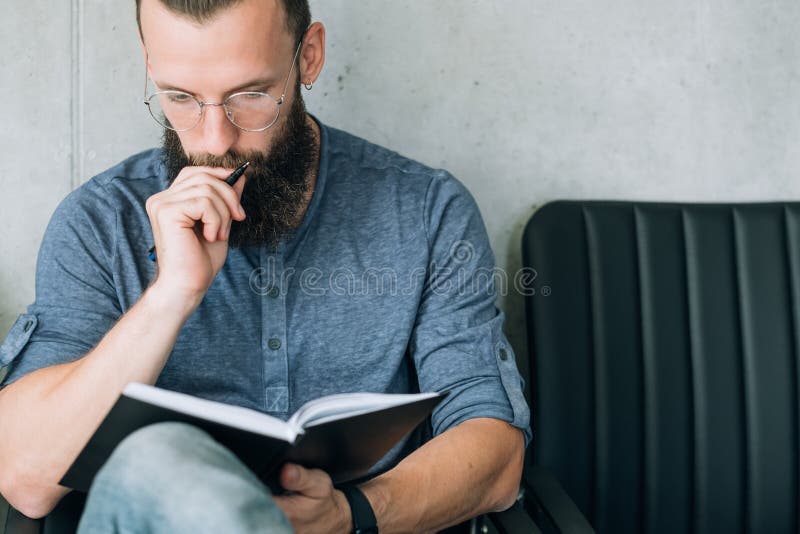 Focused Man Reading Notepad Business Data Analysis Stock Photo - Image ...
