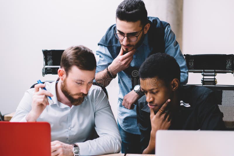 Focused Diverse Employees Thinking on Problem in Office Stock Photo ...