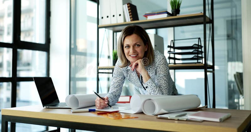 A Focused and Driven Professional Working in a Modern Workspace ...