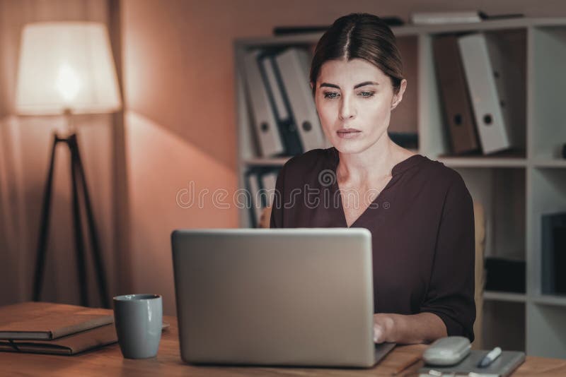 Focused Female Freelancer Submitting Project Stock Photo - Image of ...