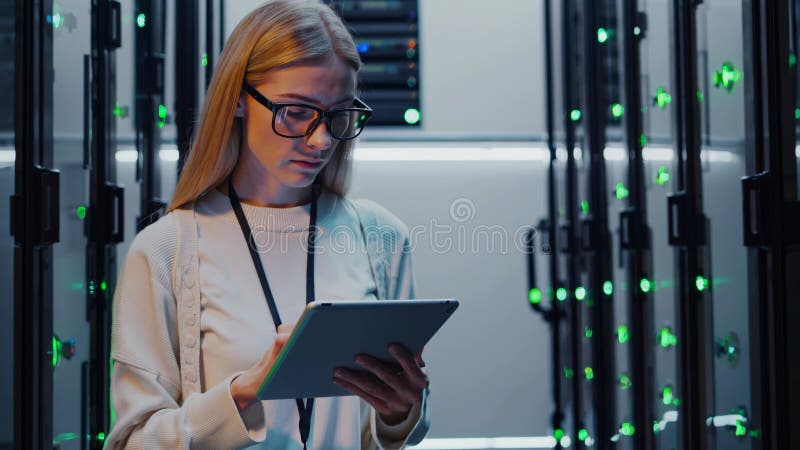 Data Center Technician Woman Inspecting Server Racks with Tablet Stock ...