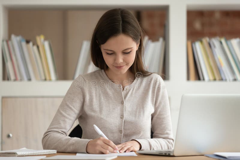 Focused Female Student Make Notes Studying at Laptop Stock Image ...