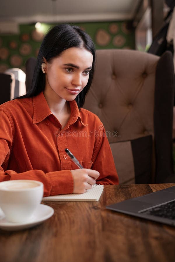 Focused Female Student Making Notes Writing Down Information from ...