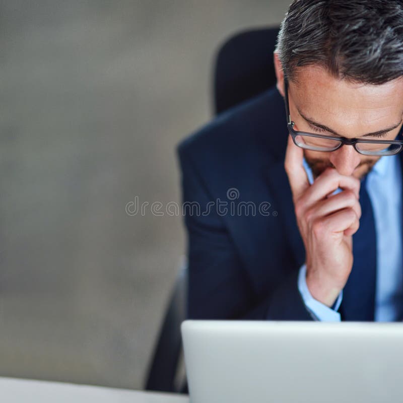 Focused on the Finer Details. a Businessman Using a Laptop in the ...