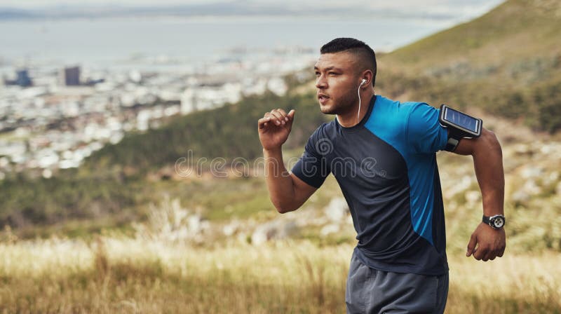 Focused on Fitness. a Young Man Running Outdoors. Stock Image - Image ...