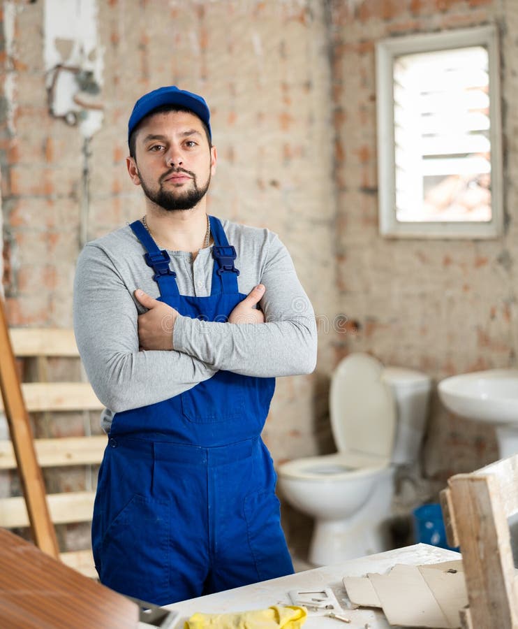 Focused Foreman Posing on Indoor Construction Site Stock Photo - Image ...