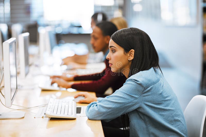 Focused on Getting Well-prepared for Finals. Shot of a Group of ...