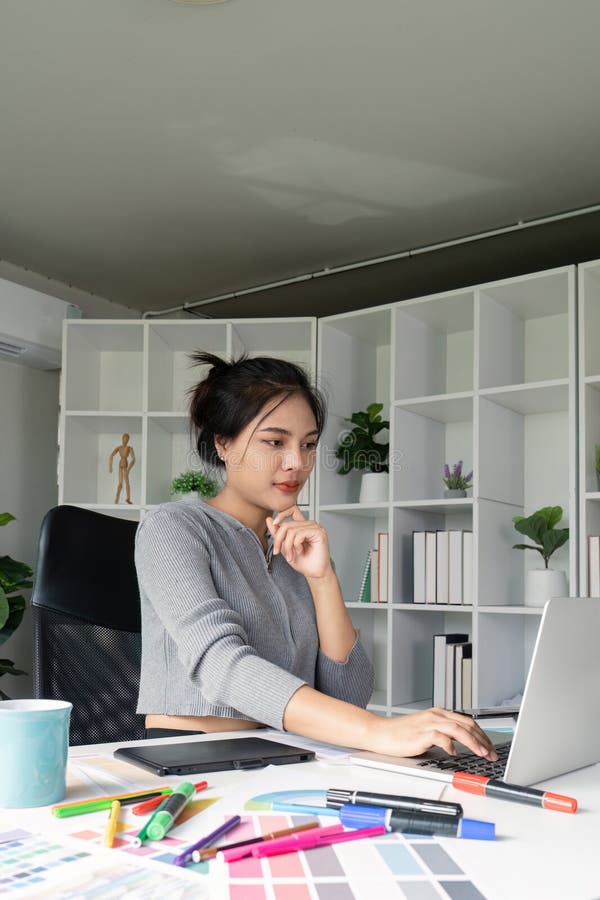 Focused Graphic Designer Working on Laptop in Home Office Stock Image ...