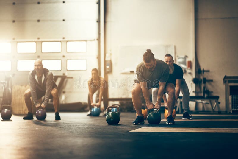 People Exercising Together with Dumbbells in a Gym Class Stock Image ...