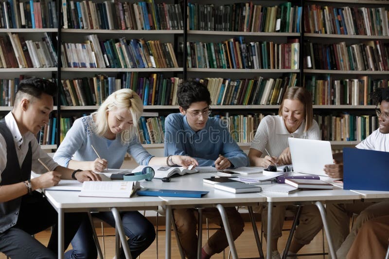 Focused Group of Happy Diverse Students Studying in Library. Stock ...