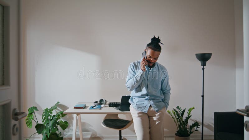 Focused Guy Talking Mobile Home Office. Smart Professional Speaking ...