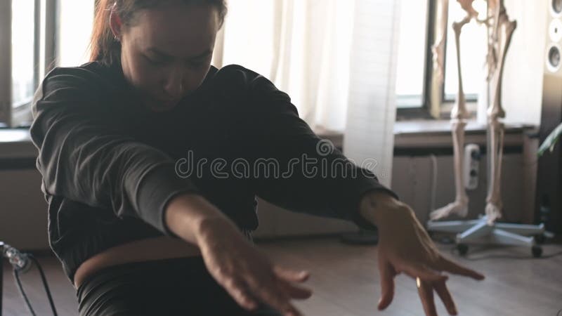 Focused Gym Session Where Woman Trains for Spinal Alignment and Posture. Alignment Training ...