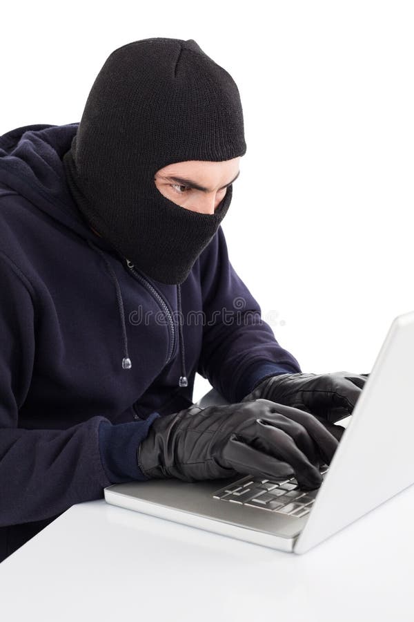 Hacker in Balaclava Hacking Laptop while Looking at Camera Stock Image ...