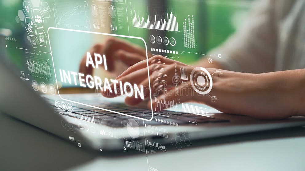 Focused Hands Typing on Laptop with API Integration Concepts in Digital Interface and Data ...
