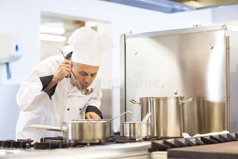 Focused Head Chef Tasting Food from Ladle Stock Image - Image of ...