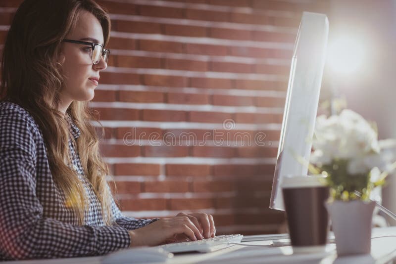 Focused Hipster Businesswoman Watching Computer Stock Photo - Image of ...