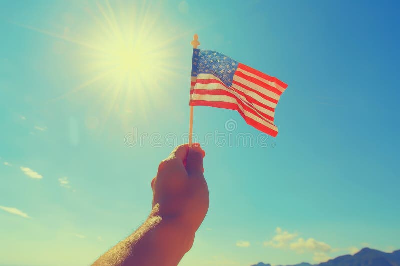 Focused Image of a Hand Proudly Holding a Flag, of America is ...