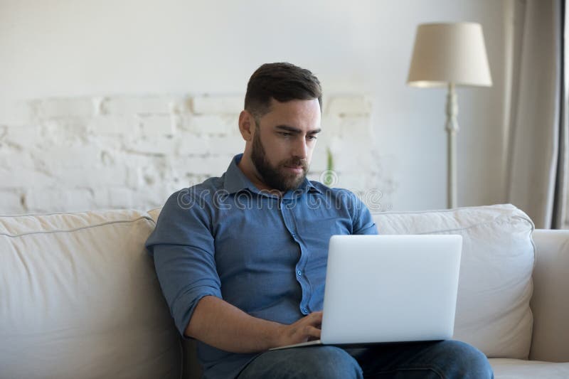 Focused Laptop User Freelancer Man Working from Home Stock Photo ...