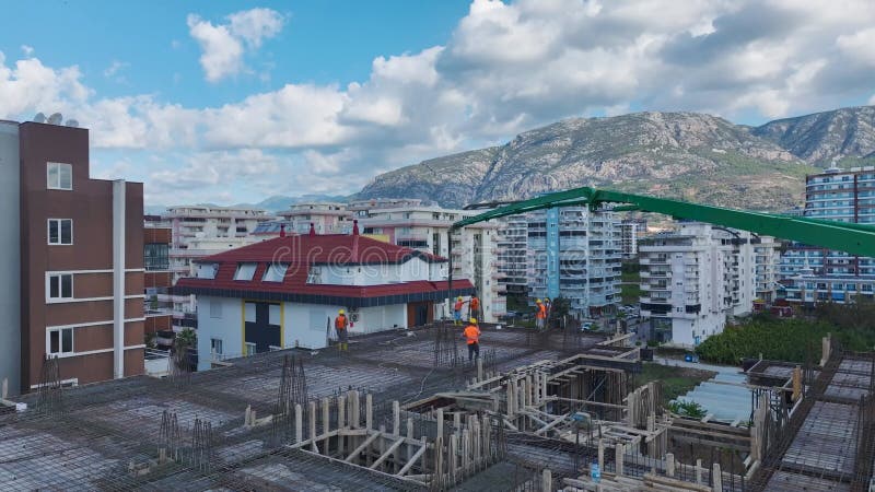 Aerial View: a Dynamic Construction Site with Active Workers and Heavy ...