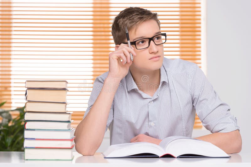 Focused Male Student Working in Studio. Stock Photo - Image of books ...