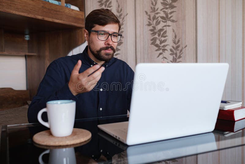 Focused Man Sitting at Desk Watching Webinar Video Course Stock Image ...
