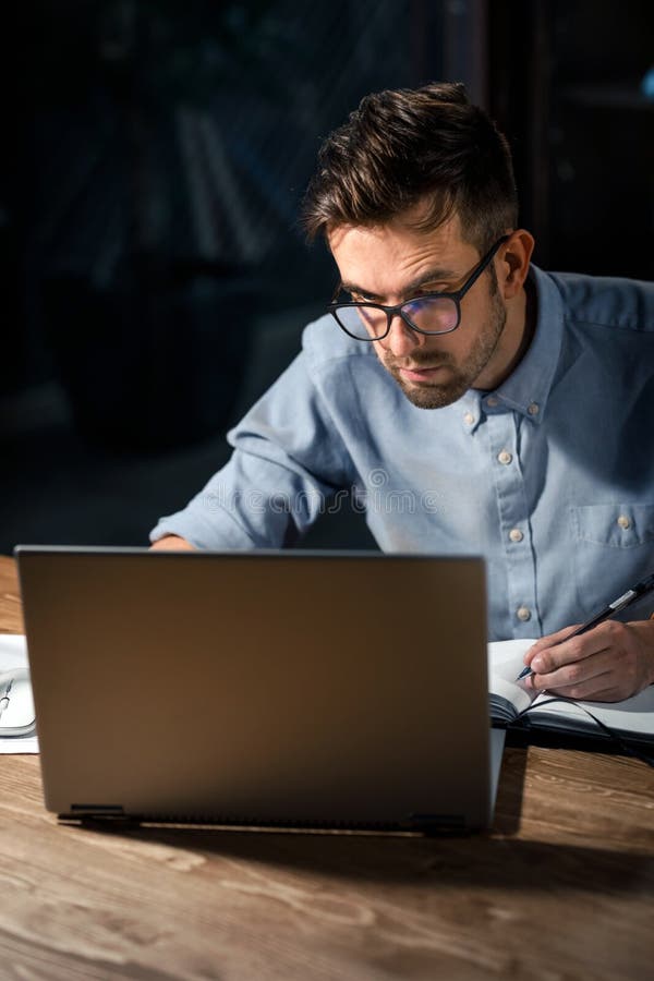 Focused Man Watching Laptop at Work Stock Image - Image of occupation ...