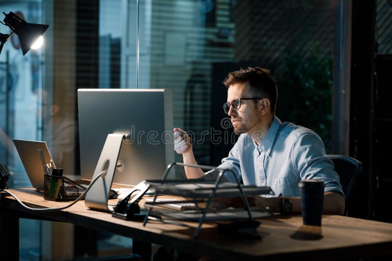 Focused Man Working with Computer Late Stock Photo - Image of project ...