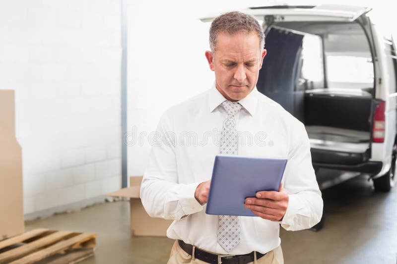Senior Man in Business Attire Holding Tablet and Reviewing Delivery Van ...