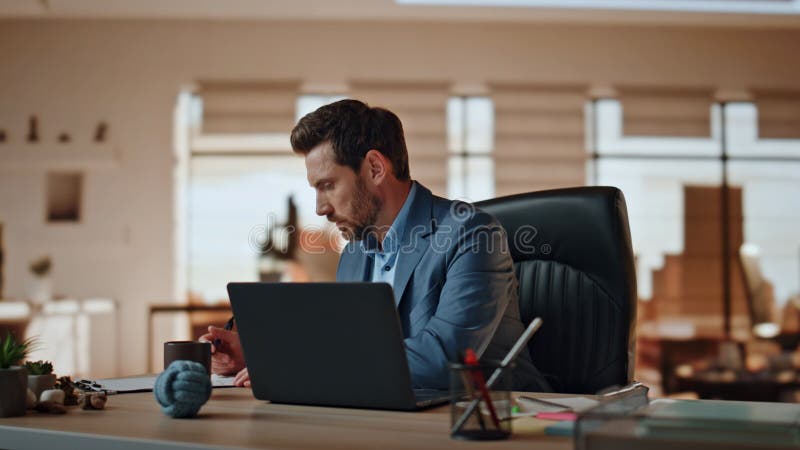 Focused Manager Writing Notes at Light Workplace Closeup. Man Making ...