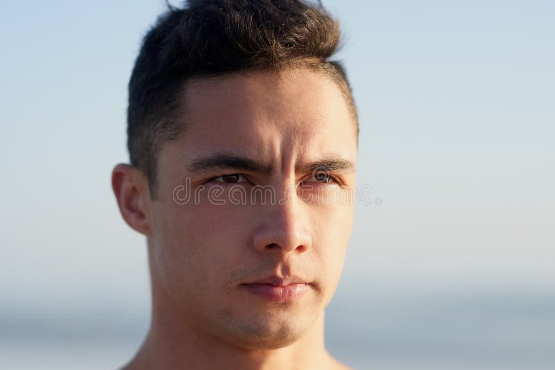 Focused on Moving Forward. a Handsome Young Man at the Beach. Stock ...