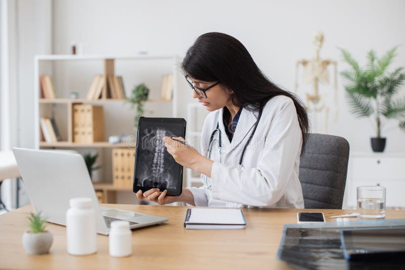 Focused Nurse Talking with Patient with Help of Devices Stock Image ...