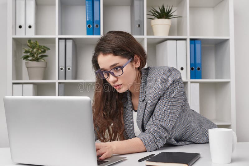 Focused Office Worker Using Laptop Stock Photo - Image of business ...