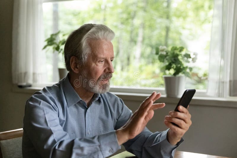 Focused Old Grey Haired Man Using App on Smartphone Stock Image - Image ...